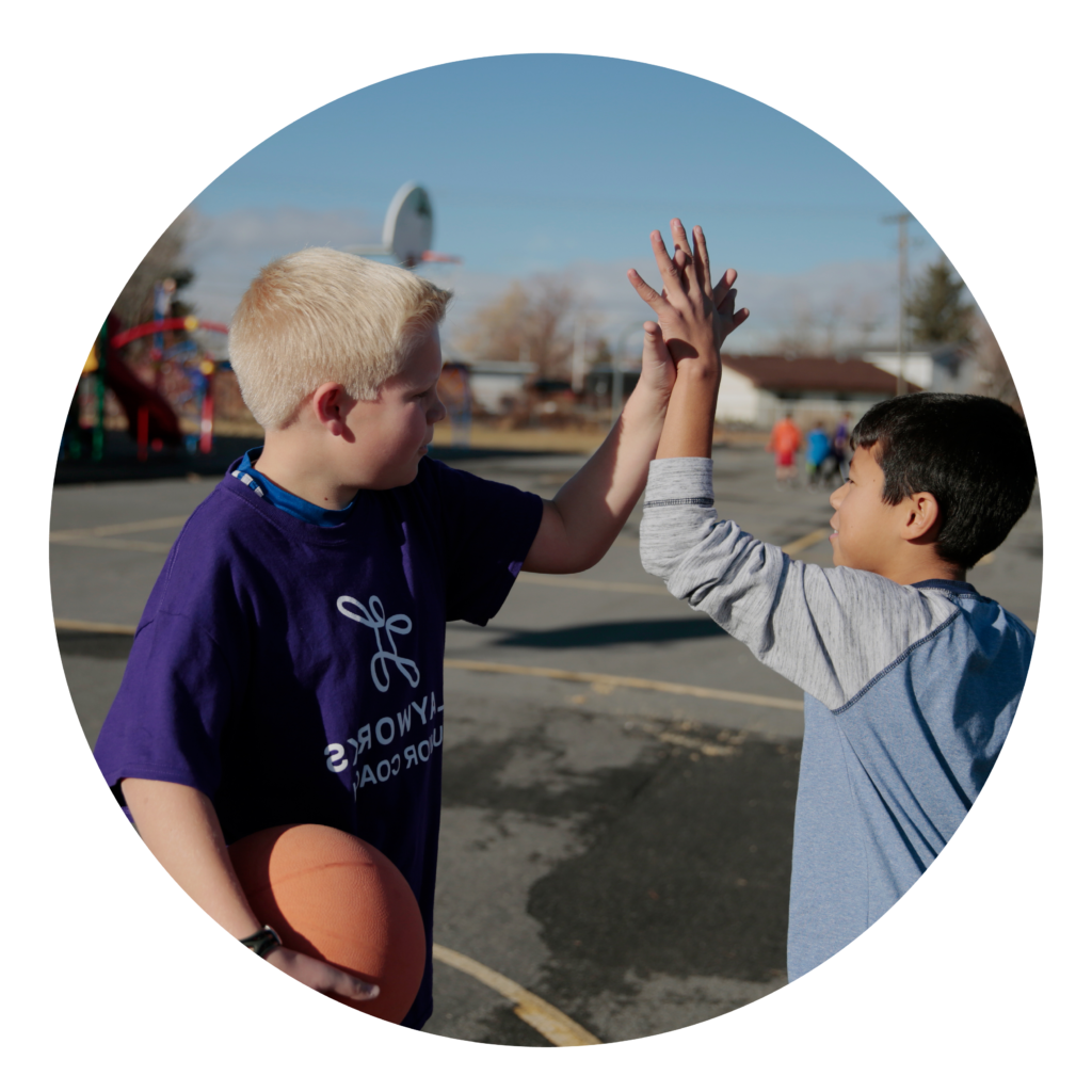 kids high-five circle picture | Playworks